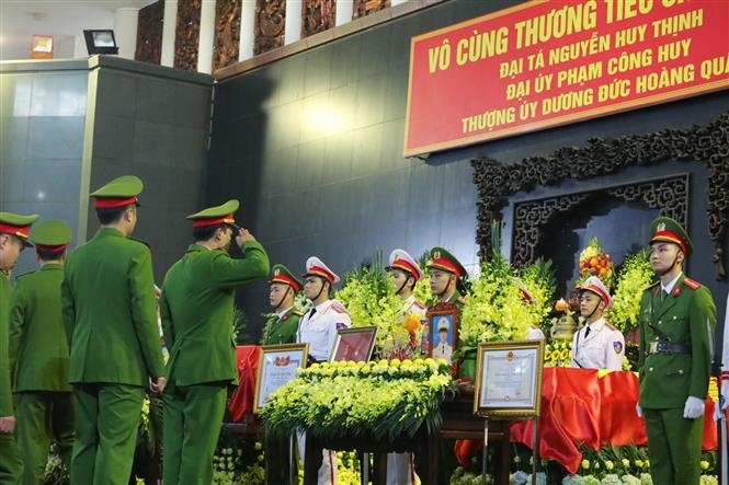 Funeral held for three police officers who died in Dong Tam disturbance